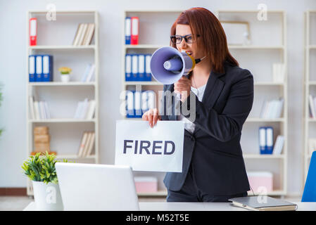 Businesswoman firing people in office Stock Photo - Alamy