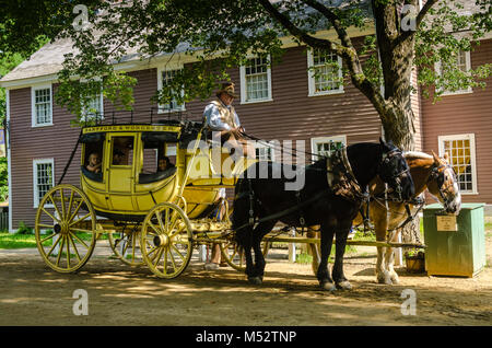 Horse drawn stagecoach at Old Sturbridge Village, a museum depicting ...