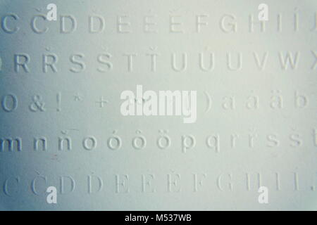 Embossed writing for blind people used before Braille writing system ...