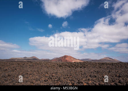 Red volcanic landscape, lava scenary with volcano crater in the ...