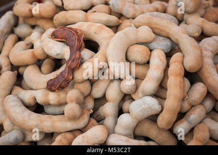 Organic tamarind peel, tamarind background, It is brown in color and ...