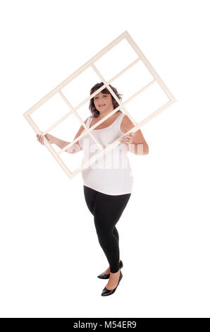 Big woman holding window frame Stock Photo - Alamy