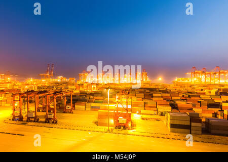 Night Loading dock at a warehouse. modern logistics center. docking ...