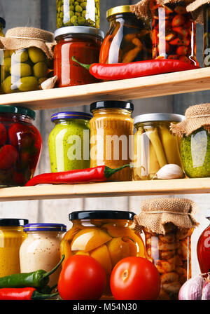 Jars with variety of pickled vegetables Stock Photo - Alamy