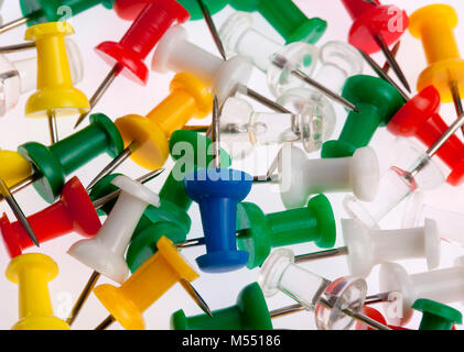 Closeup of Many Colored Thumbtacks on White Stock Photo - Alamy