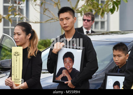 Parkland, Florida, USA. 18th Jan, 2018. Family members hold up Peter ...