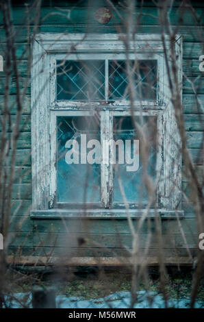 Landscape through rough stone window Stock Photo - Alamy