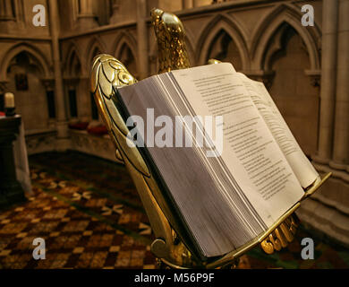 open vintage book with golden pages. bible with golden decoration over ...