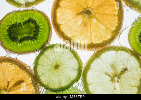 citrus slices floating in water Stock Photo - Alamy