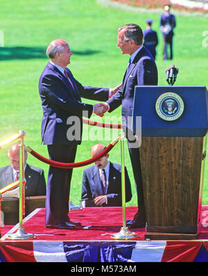 Soviet President Mikhail S. Gorbachev shakes hands with a Chinese ...