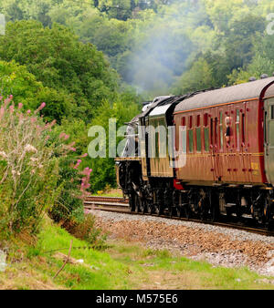 Black Five steam locomotive 44932 with a set of vintage coaches at ...