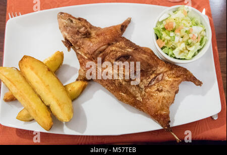 Traditional Quechua meal of guinea pig served in a restaurant in Cuzco ...