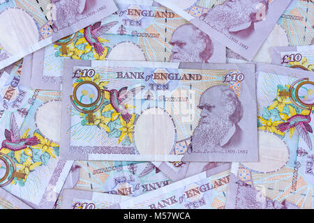 A British Sterling old paper ten pound note screwed up on isolated ...