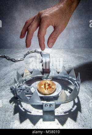Bitcoin on a mouse trap Stock Photo - Alamy