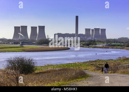 Fiddlers Ferry power station and Ferry Tavern on the banks of the river ...