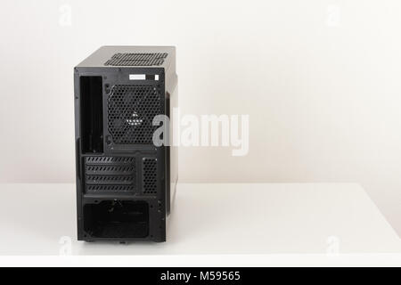 white open empty midi tower pc computer case side view on isolated ...