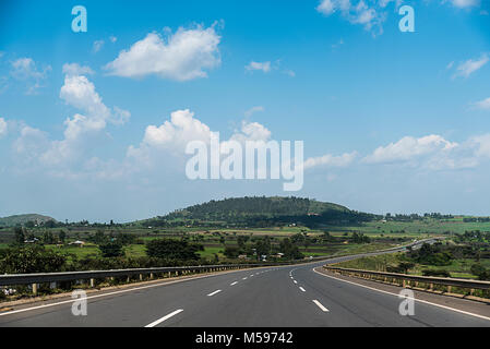 Addis Ababa Highway surrounded by green trees and mountains - Ethiopia ...