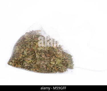 Organic mint melange tea bag isolated on white background Stock Photo ...