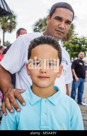 Hispanic father with children, latin kids with parent smiling, real ...