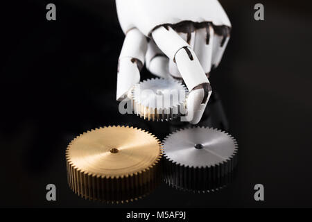 Robot Hand Gear Wheel Stock Photo - Alamy