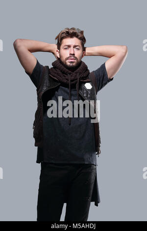 Young man with casual clothes, expressing emotions, posing on green ...