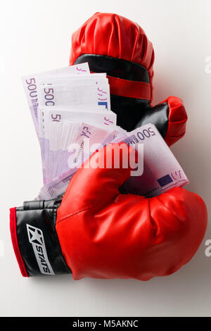 boxing gloves and money. Concept of bribery, dishonesty in sport, greed ...