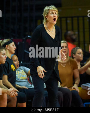 Iowa head coach Jan Jensen directs her team during the first half of an ...