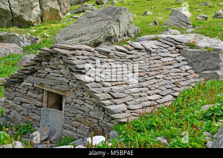 Mountain Bothy. A basic stone shelter in the mountains often used by ...