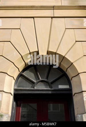 Stone arch door surround, Channelled rustication, ashlar and fanlight ...