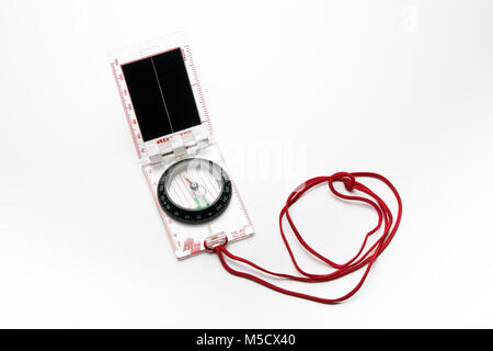 Magnetic compass, with mirror, on white Stock Photo - Alamy