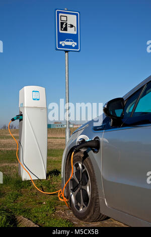 Power supply for hybrid electric car charging battery Stock Photo - Alamy
