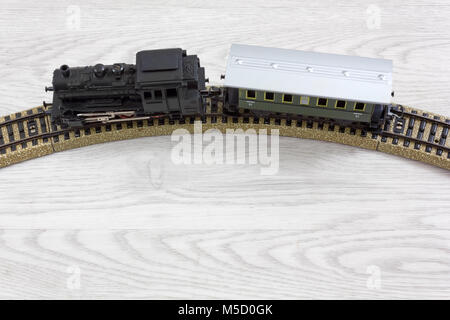 Vintage model electric train formed by a steam locomotive and two ...
