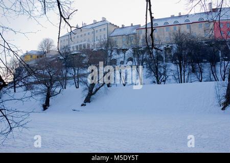 Stenbock House and Toompark in Winter, with Šnelli tiik pond frozen over and covered in snow ...