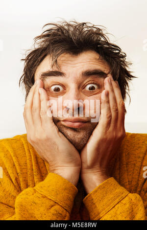 face of a disheveled man who is very surprised by what he sees Stock ...