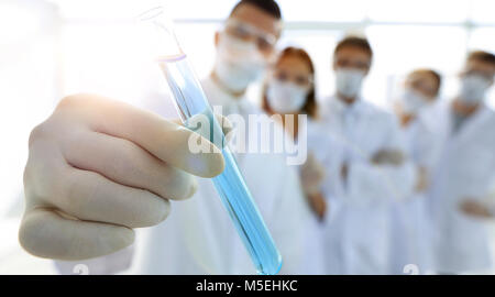 closeup of a group of medical workers working with liquids Stock Photo ...