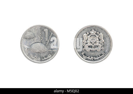 A closeup of a Moroccan Dirham coin on a brown table Stock Photo - Alamy