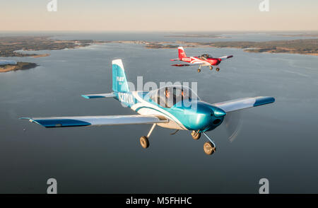 Vans RV-12 light sport aircraft flying in formation Stock Photo - Alamy