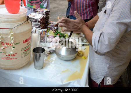 man churning lassi, Kolkata, West Bengal, India, Asia Stock Photo - Alamy