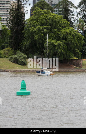 A Navigational Channel marker buoy floats on the surface of the ocean ...