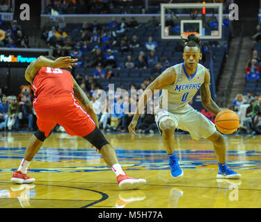 Houston forward Devin Davis (15) tries to shoot over Michigan center ...