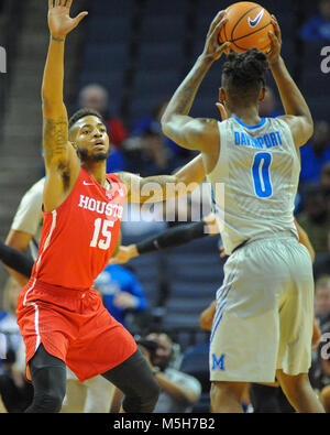 Houston forward Devin Davis (15) tries to shoot over Michigan center ...