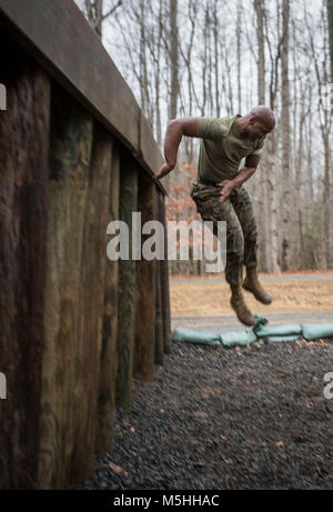 Force Fitness Instructor (FFI) student executes proper ammo can lift ...