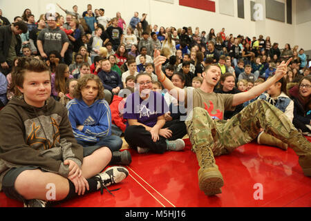 SPC Zach Nickerson engages with the students at Mexico Junior High ...