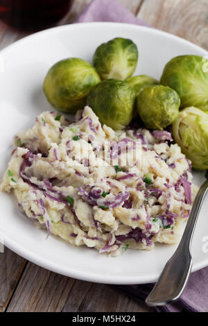 Traditional Dutch red cabbage stamppot (mash pot) with potatoes, red ...