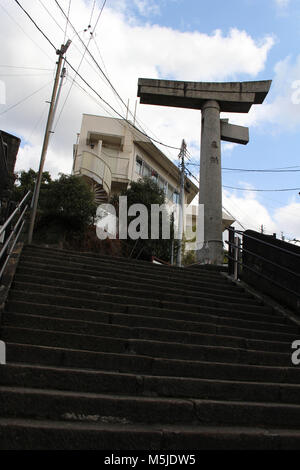 Translation: "The one-legged torii" (shinto) gate due to bombing. Taken ...