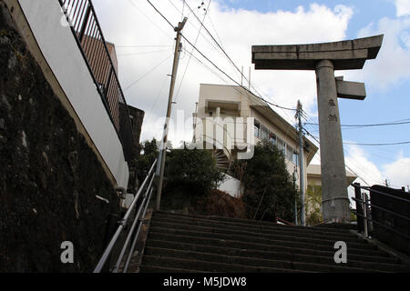 Translation: "The one-legged torii" (shinto) gate due to bombing. Taken ...