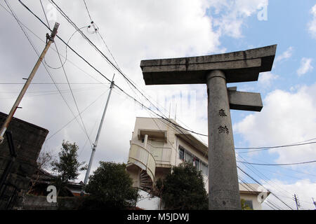 Translation: "The one-legged torii" (shinto) gate due to bombing. Taken ...