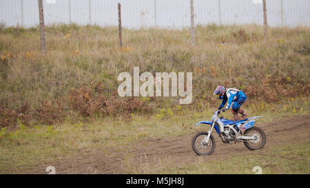 Girl mx biker - motocross racer on dirt bike at sport track Stock Photo ...