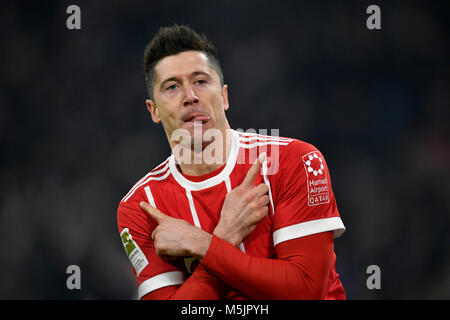 Typical goal celebration with crossed arms and outstretched tongue ...