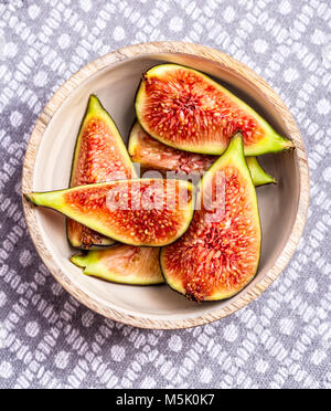 Organic fresh figs on a wooden board, studio closeup Stock Photo - Alamy
